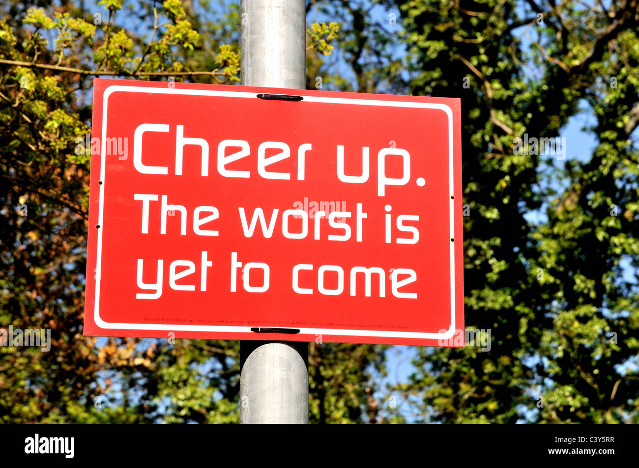 Sign 'The Worst is Yet To Come' on lamp post Stock Photo - Alamy
