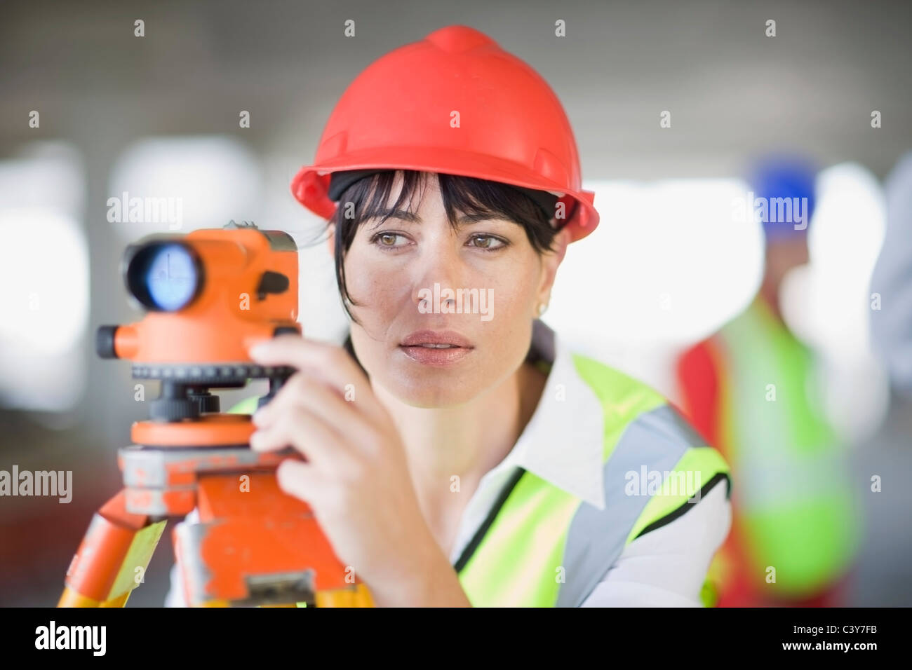 Architect doing measuring Stock Photo - Alamy