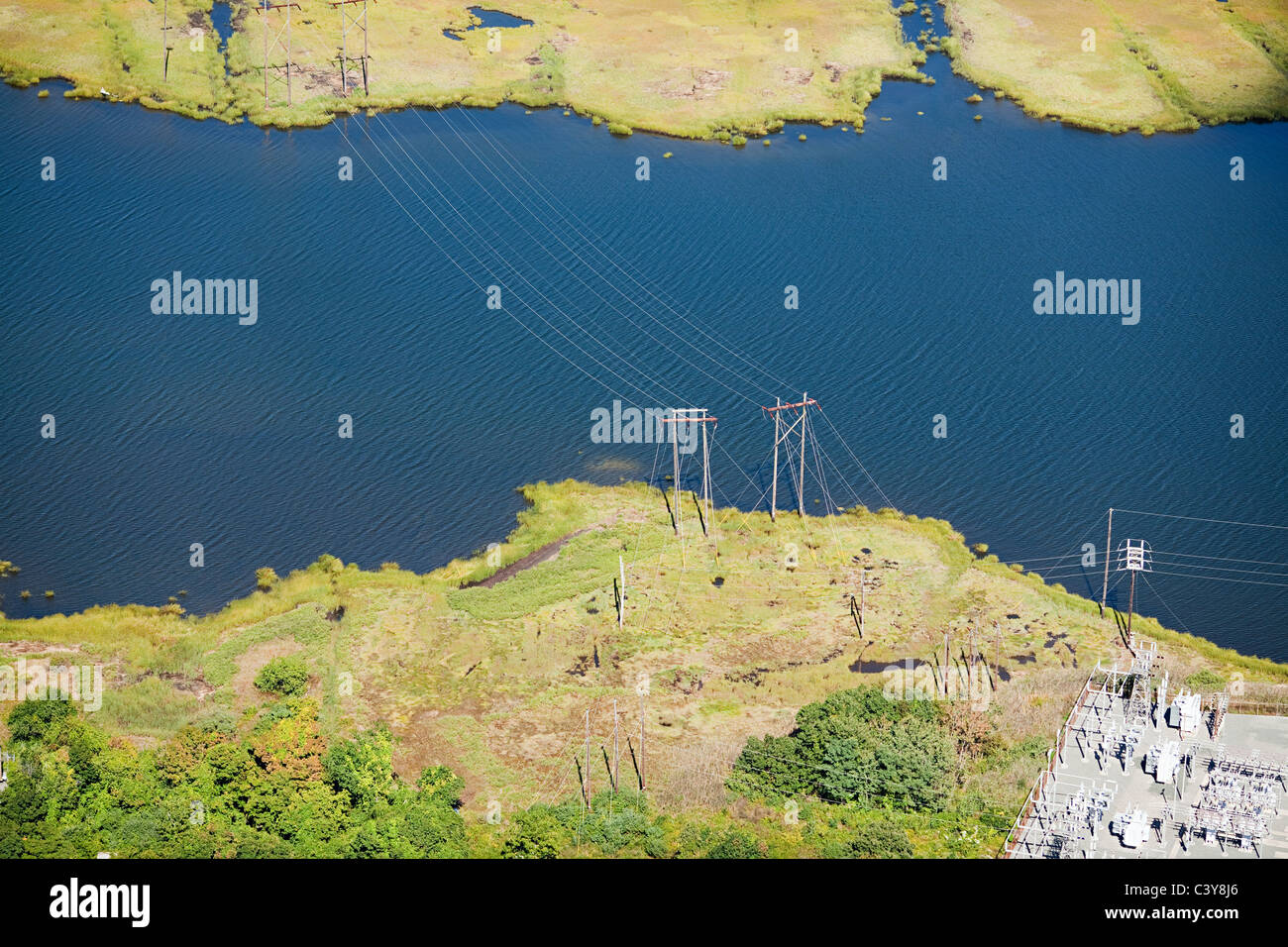 Power lines over water, Newport County, Rhode Island, USA Stock Photo ...