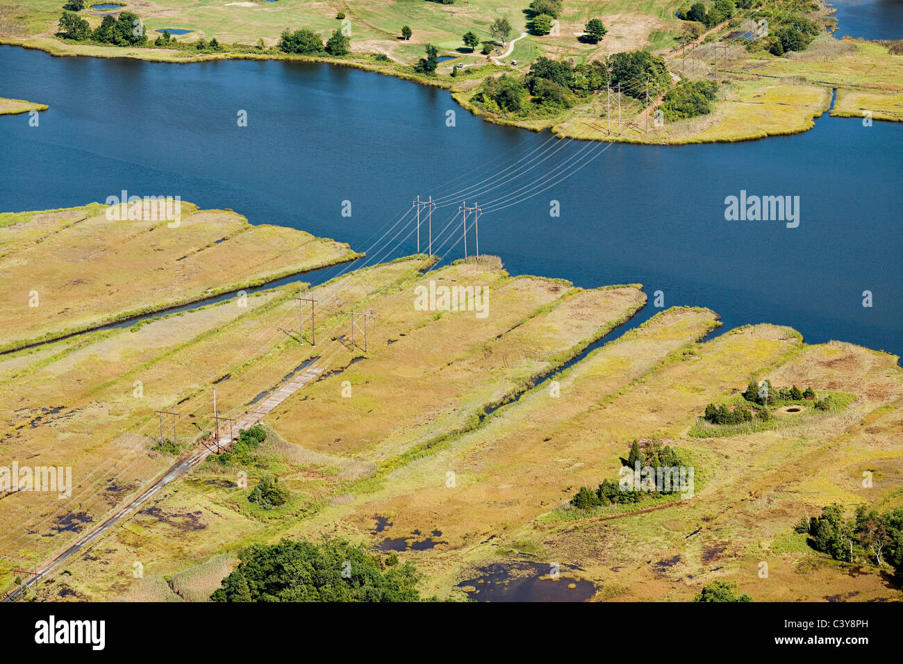 Power lines over water, Newport County, Rhode Island, USA Stock Photo ...
