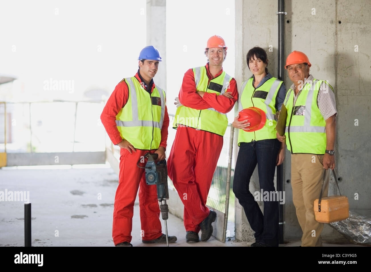 Group of building workers Stock Photo - Alamy