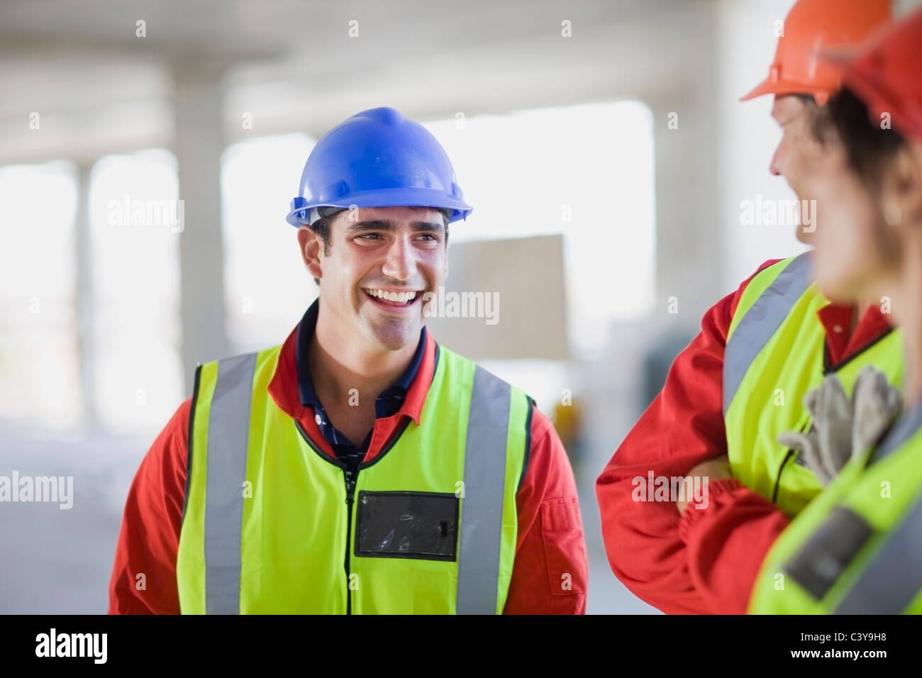 Building workers having fun Stock Photo - Alamy