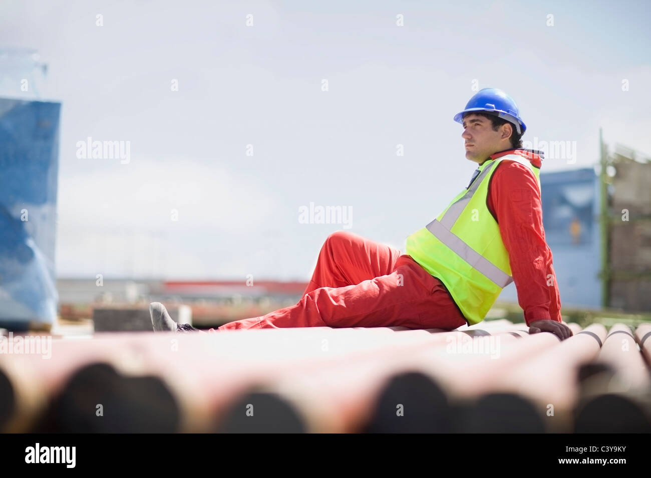 Building worker having a rest Stock Photo - Alamy