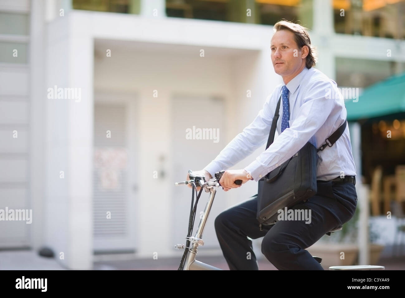 Man riding a bicycle Stock Photo - Alamy