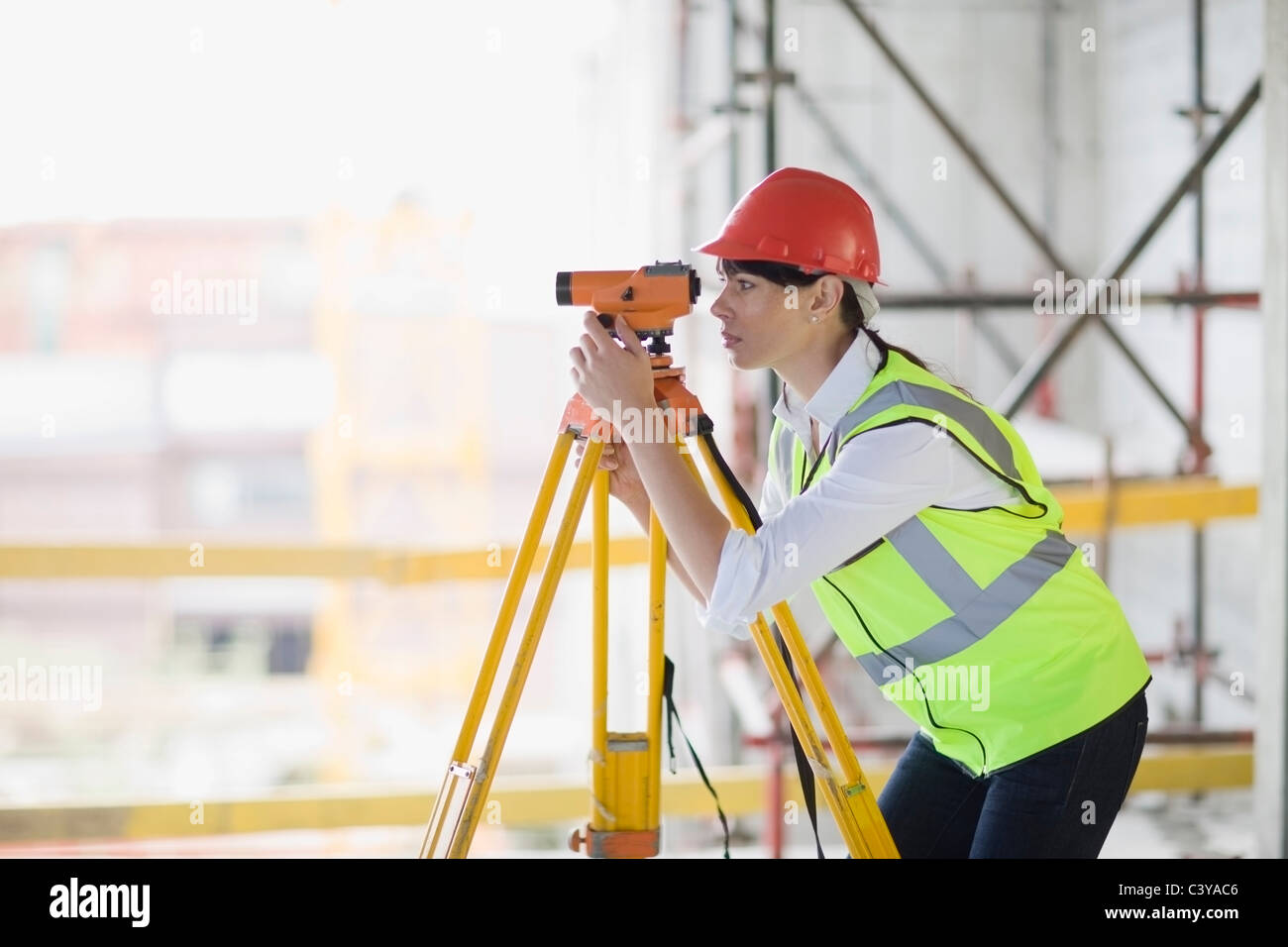 Architect doing measuring Stock Photo - Alamy