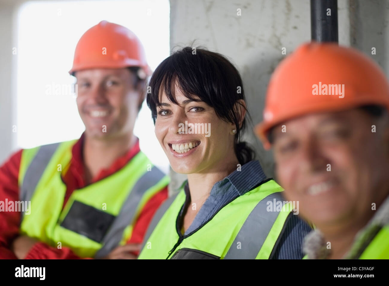 Group of smiling workers Stock Photo - Alamy