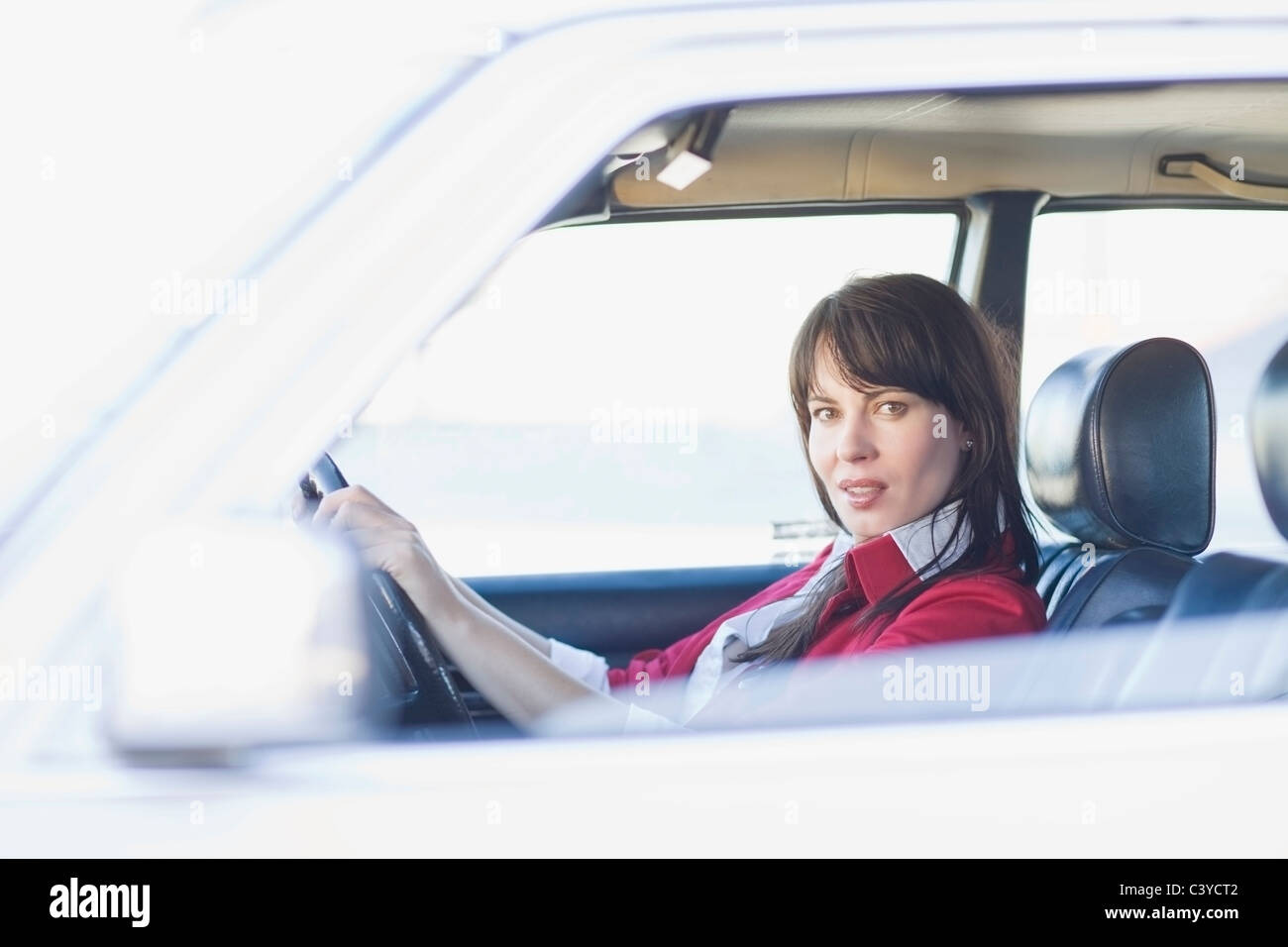 Woman driving a car Stock Photo - Alamy