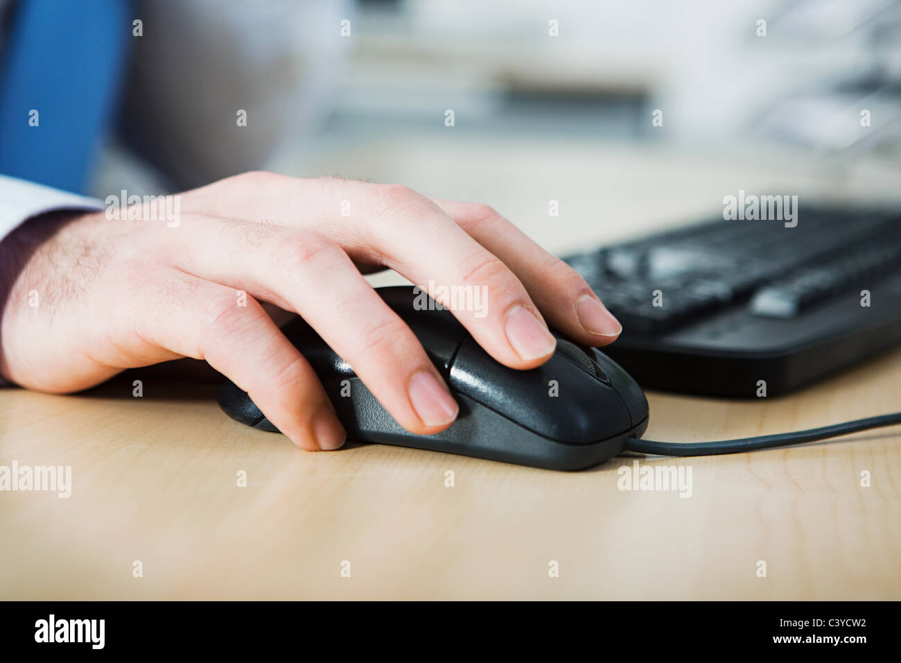 Office worker using computer Stock Photo - Alamy