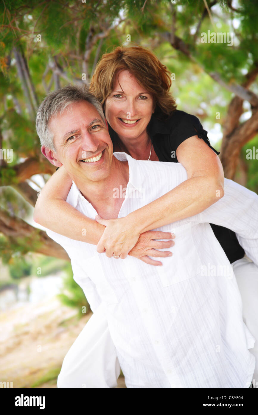 Mature couple smiling and having fun Stock Photo - Alamy