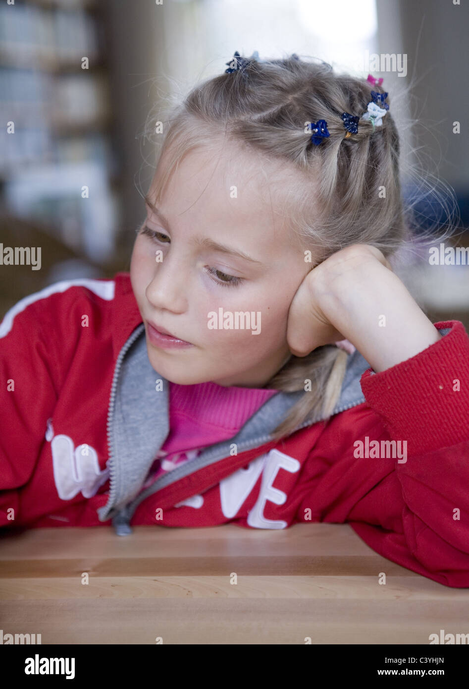 Young girl contemplating Stock Photo - Alamy