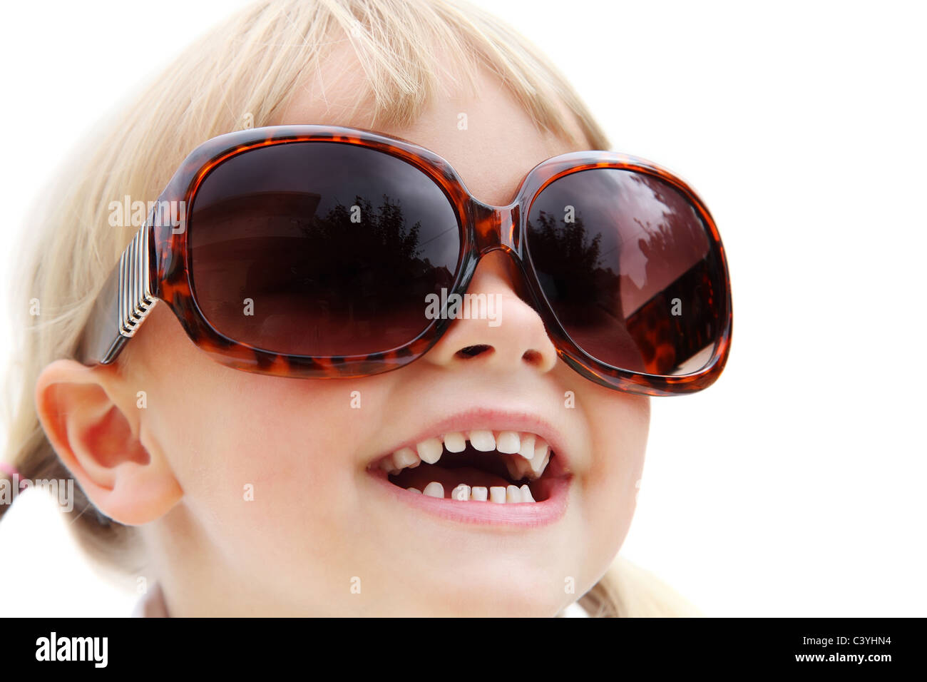 Cute little girl wearing sunglasses. Isolated on white Stock Photo - Alamy