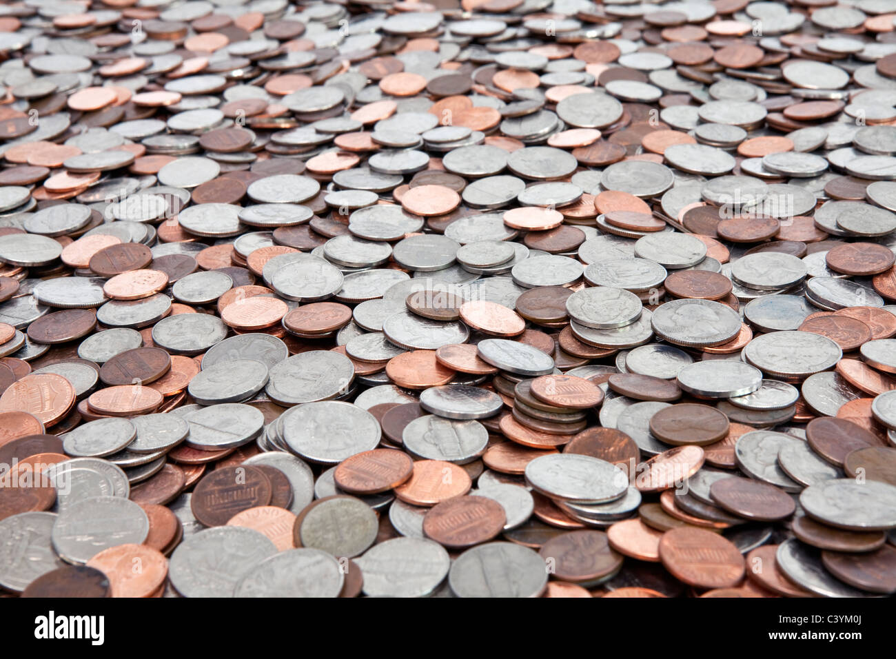 Large US coin background Stock Photo - Alamy