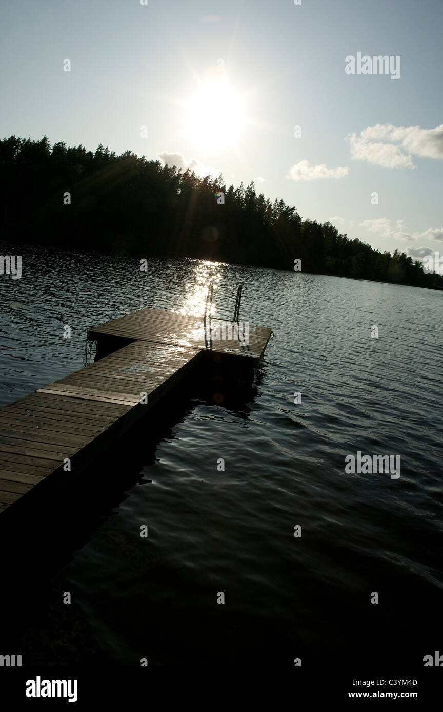Lake pier sun facing camera hi-res stock photography and images - Alamy