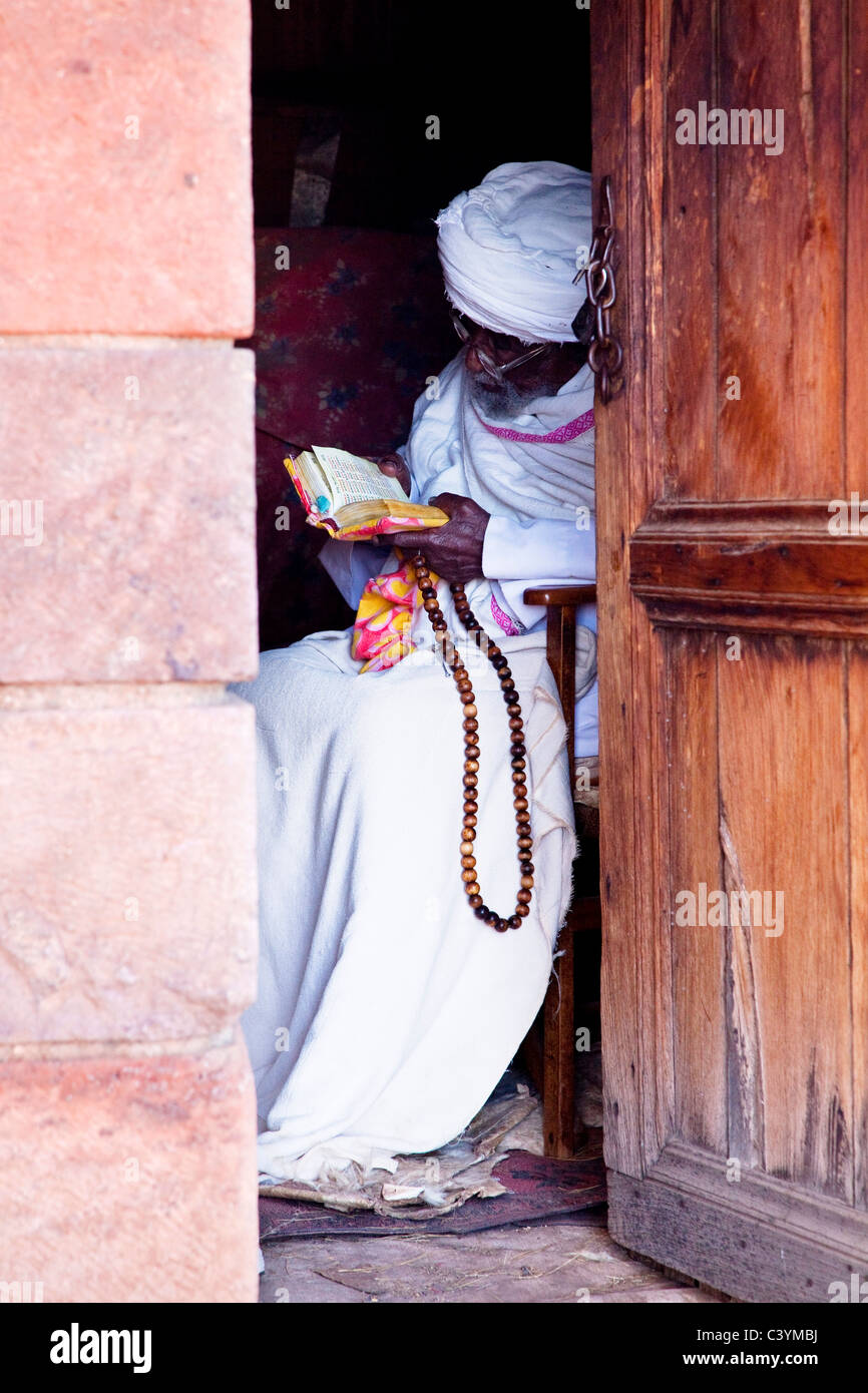 Coptic priest praying in orthodox church in Lalibela, Ethiopia, Africa ...