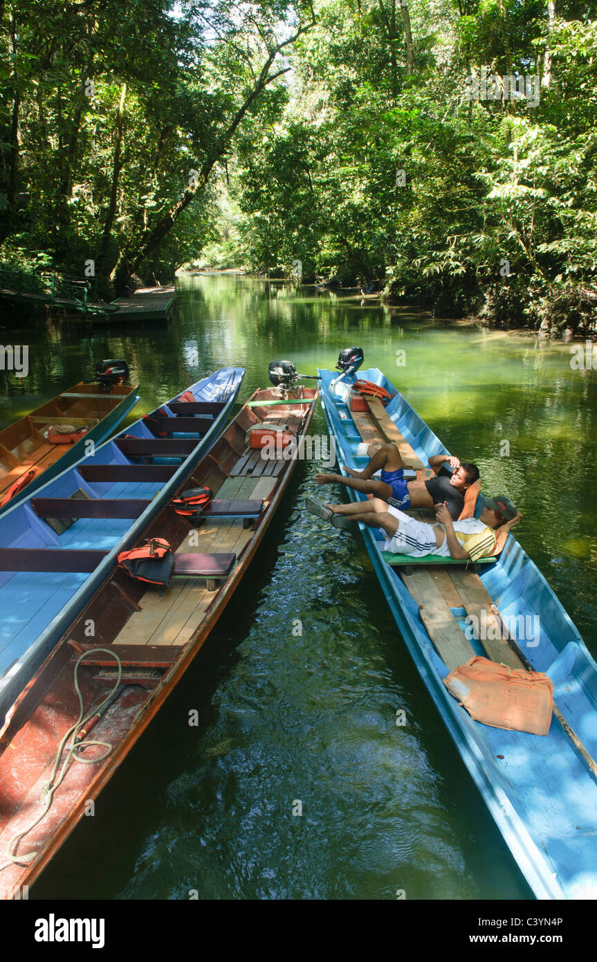 boats and beautiful jungle pool in Mulu National Park in Sarawak ...