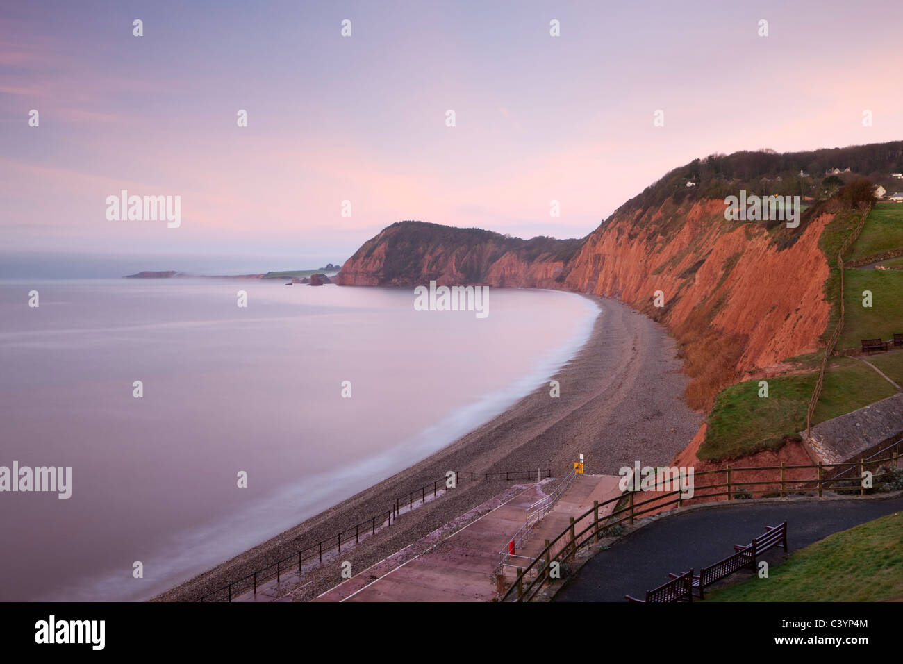 Pink dawn sky above High Peak and the distinctive red sandstone rocks ...