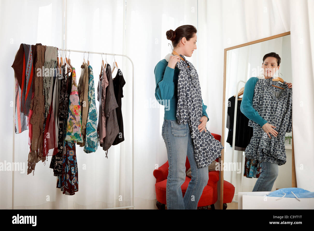 Lady trying on clothes hi-res stock photography and images - Alamy