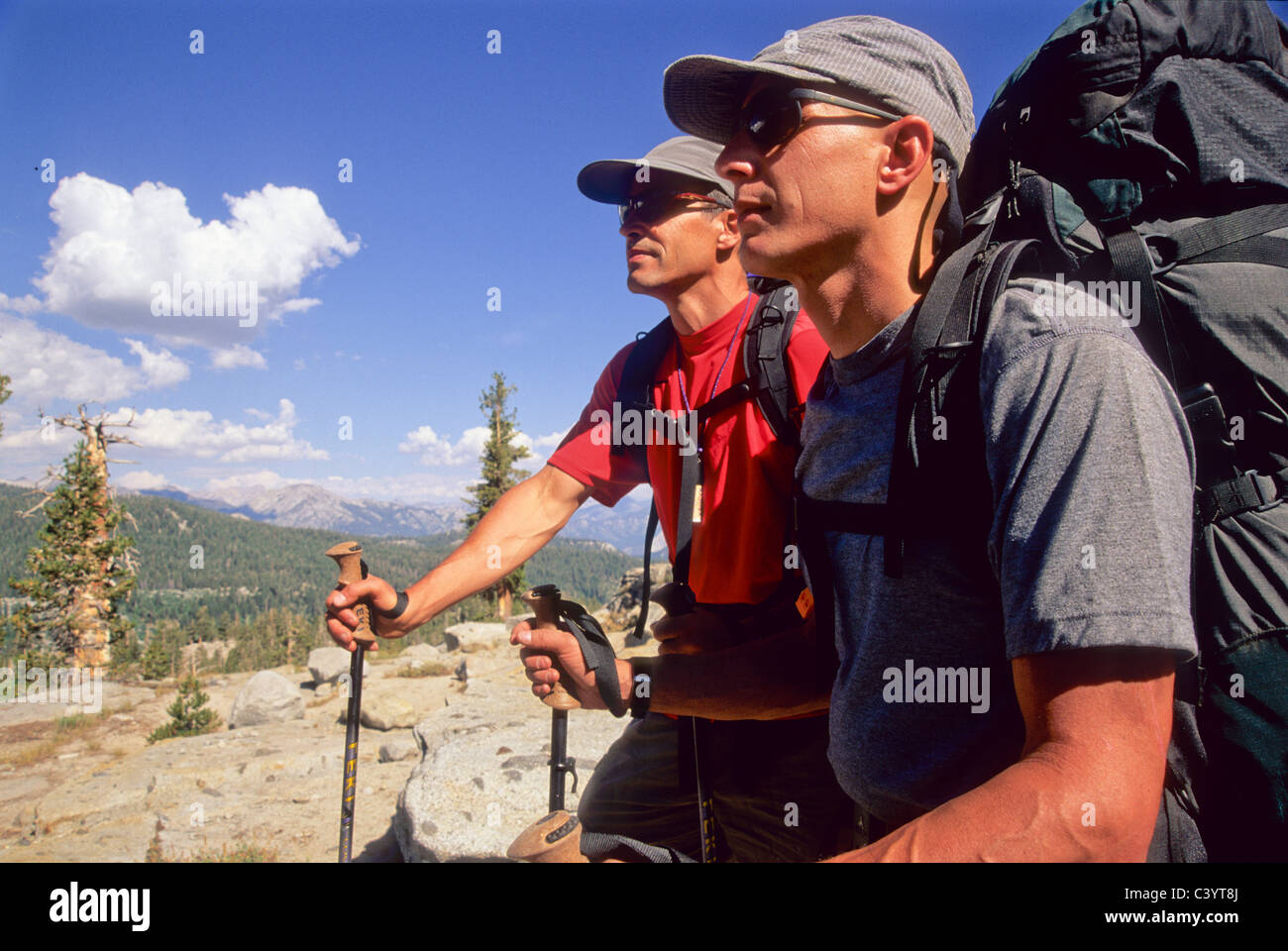 Two people backpacking Stock Photo - Alamy