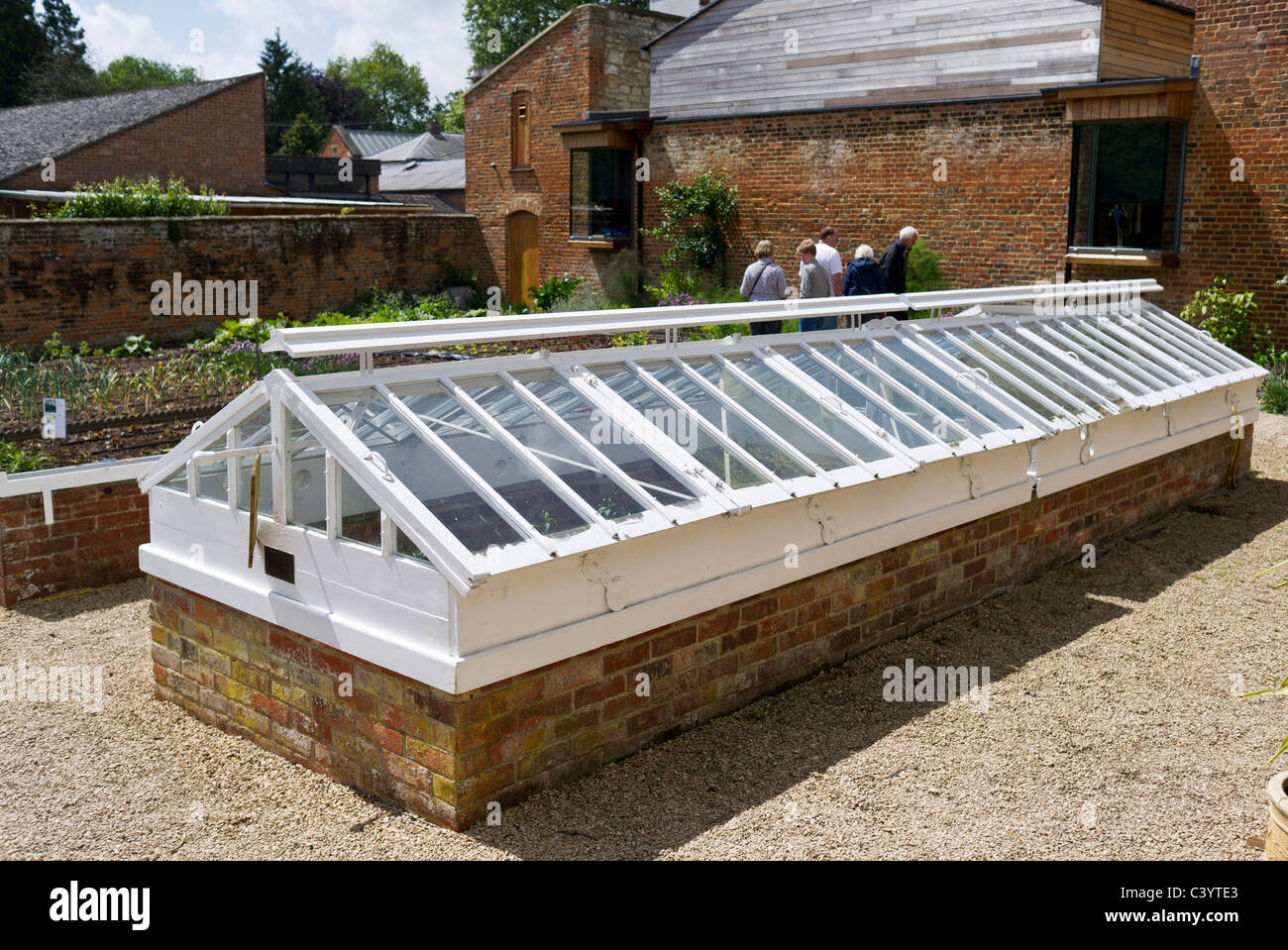 Double Dutch Lights with raised variable ridge ventilators in a walled ...