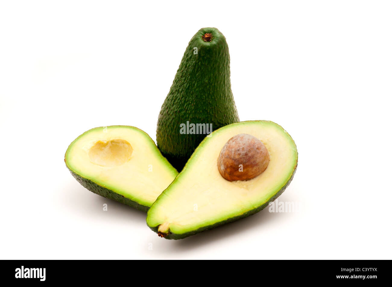 Avocado fruit on a white background Stock Photo - Alamy