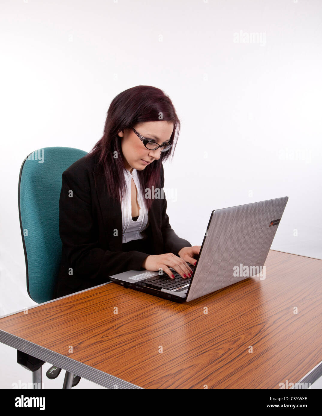 Office secretary with laptop computer Stock Photo - Alamy