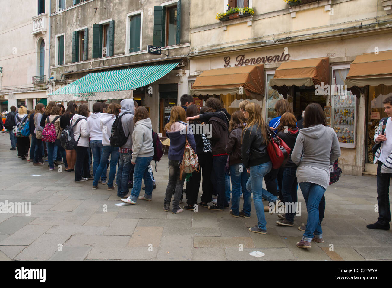 Teenage students in queue Cannaregio district Venice Italy Europe Stock ...