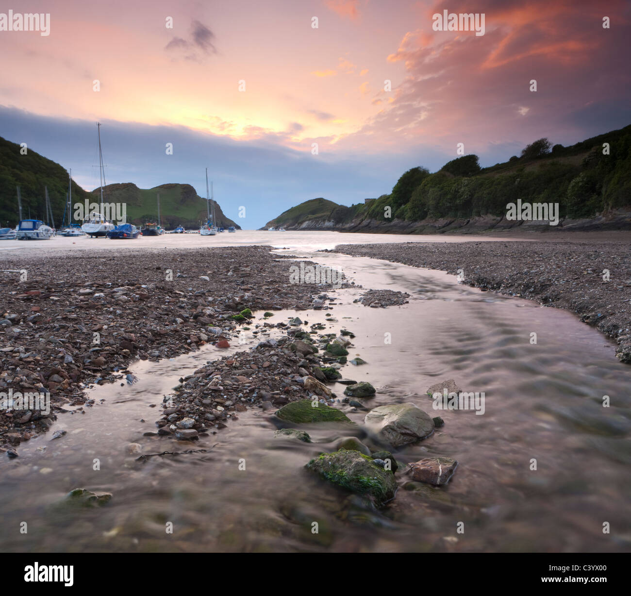 Sunset over Water Mouth Cove, Devon, England. Spring (May) 2011 Stock ...