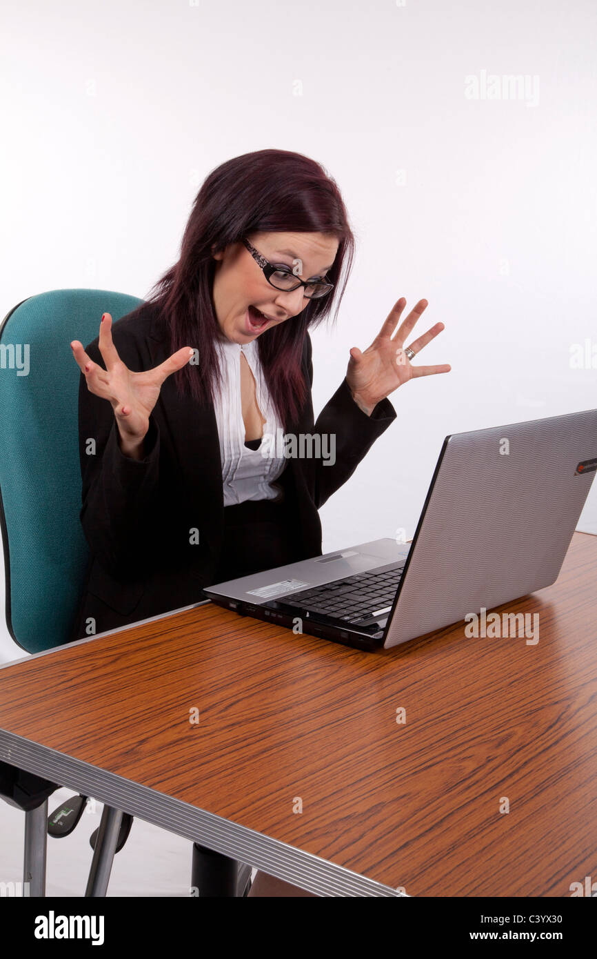 Office secretary with laptop computer Stock Photo - Alamy