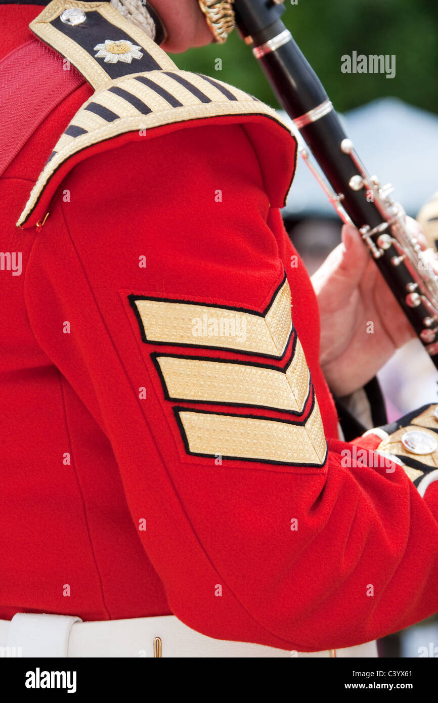 Close-up shoulder & arm of sergeant in the band of the Scots Guards in ...
