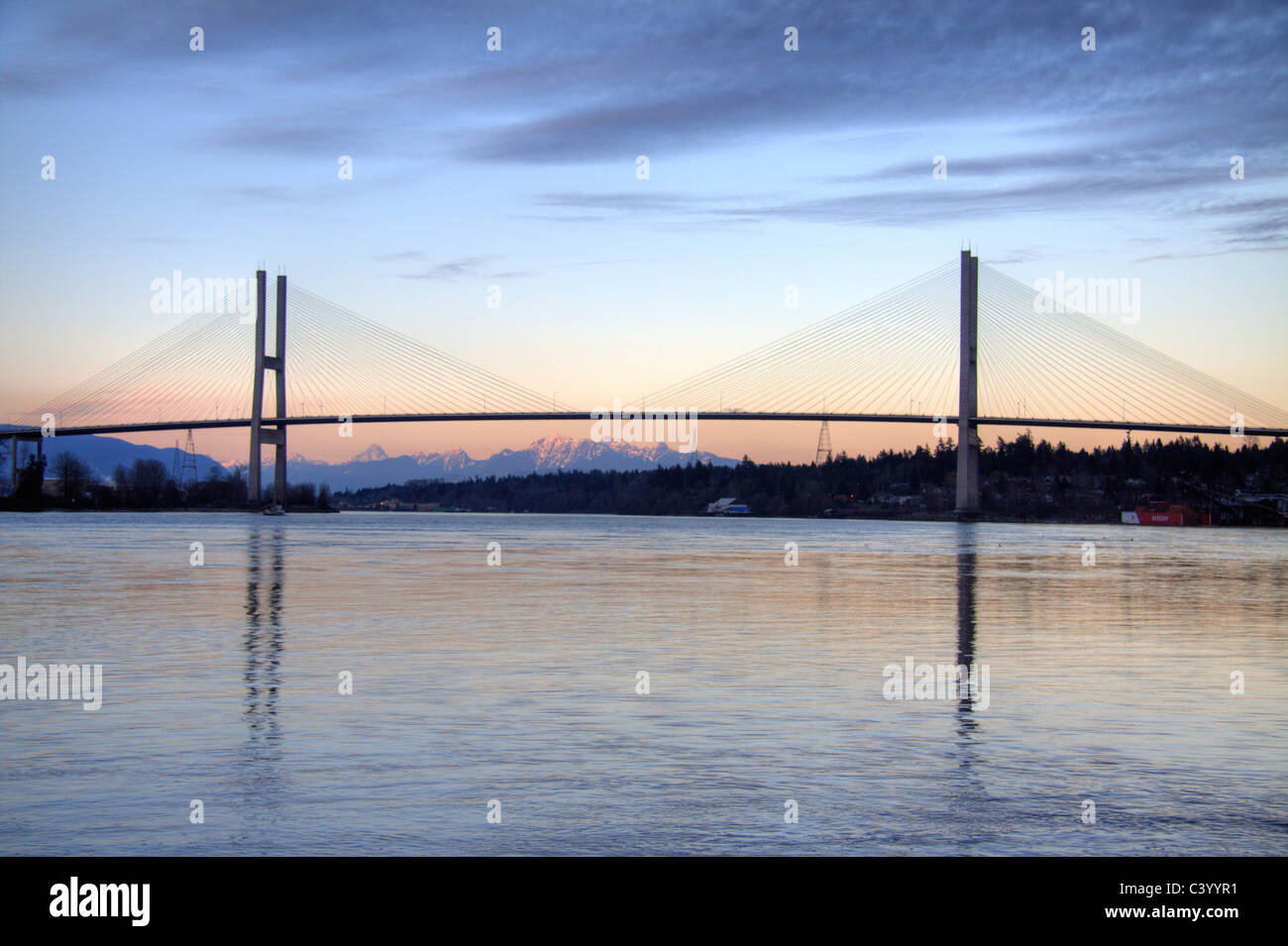 Alex Fraser Bridge over the Fraser River at sunset, Delta, BC, Canada ...
