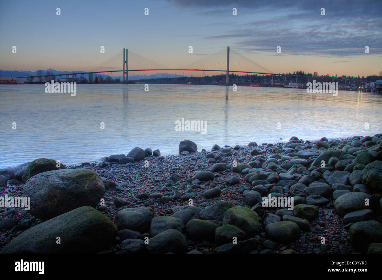 Alex Fraser Bridge over the Fraser River at sunset, Delta, BC, Canada ...