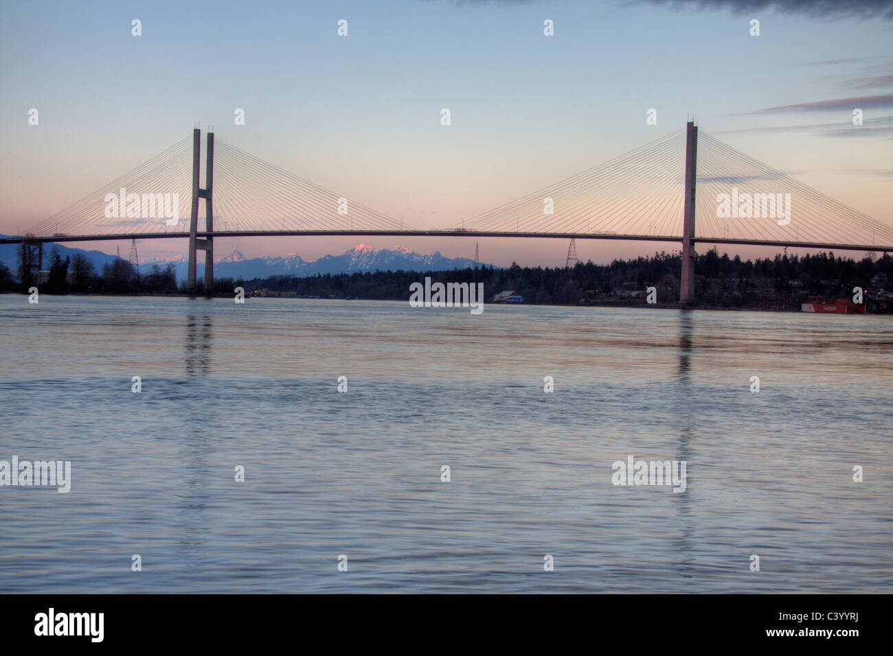 Alex Fraser Bridge over the Fraser River at sunset, Delta, BC, Canada ...