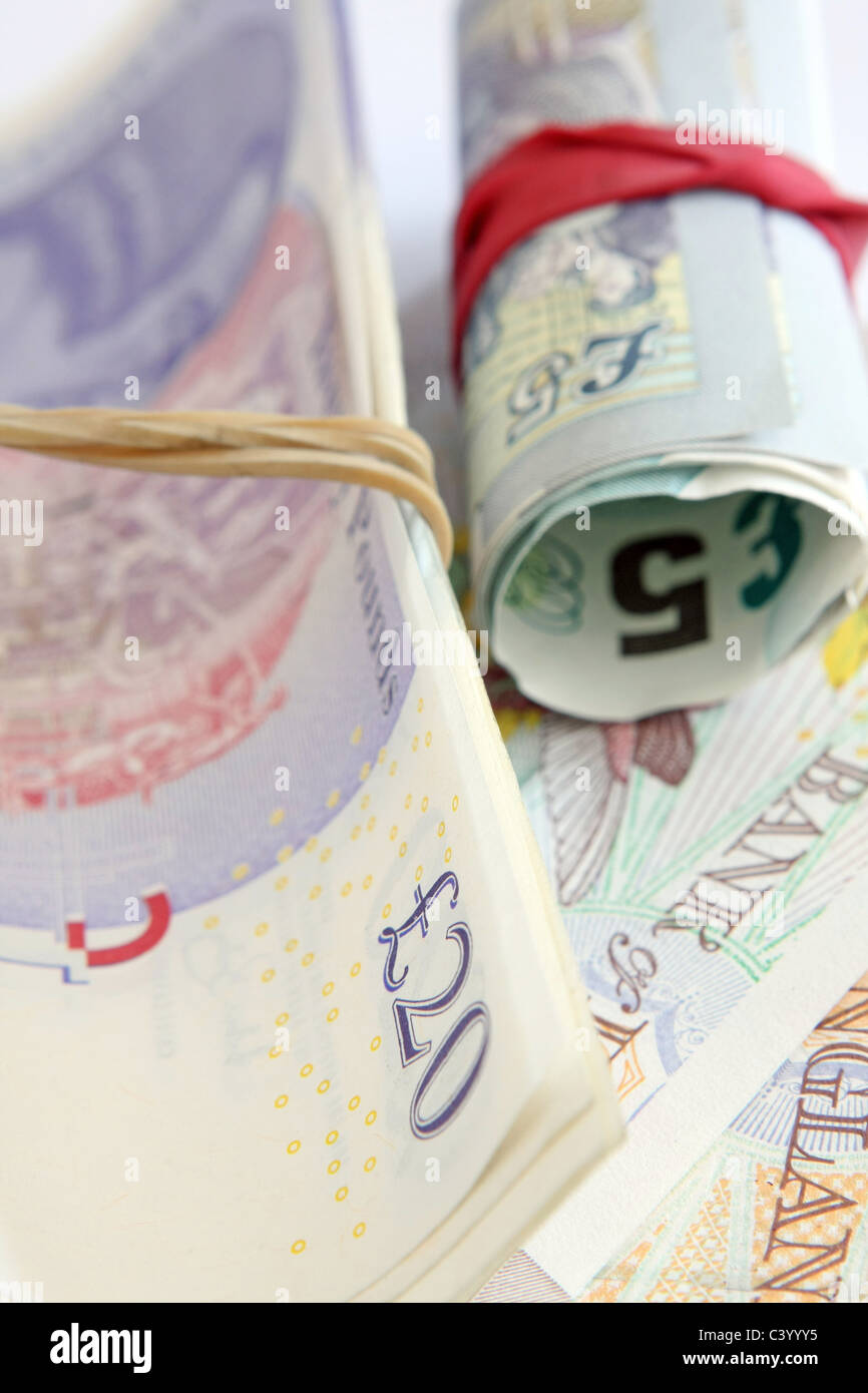 Elastic bands around sterling £20 and £5 notes - all on £10 notes Stock ...