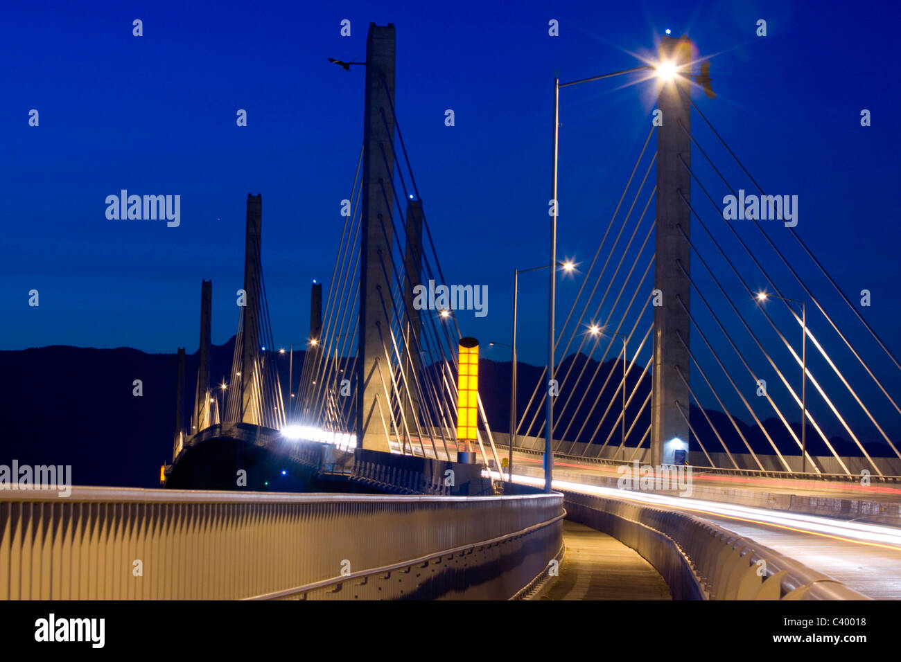 Golden Ears Bridge with traffic at night, motion blur. Between Langley ...