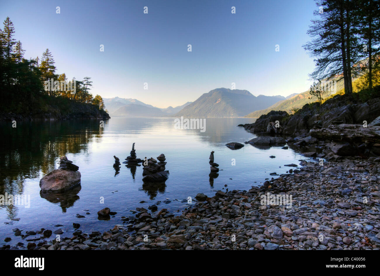 Creatively stacked stones mirrored on Harrison Lake, near Harrison Hot ...