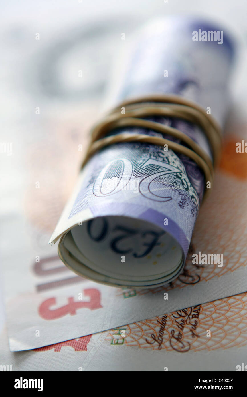 Rolled up bank notes hi-res stock photography and images - Alamy