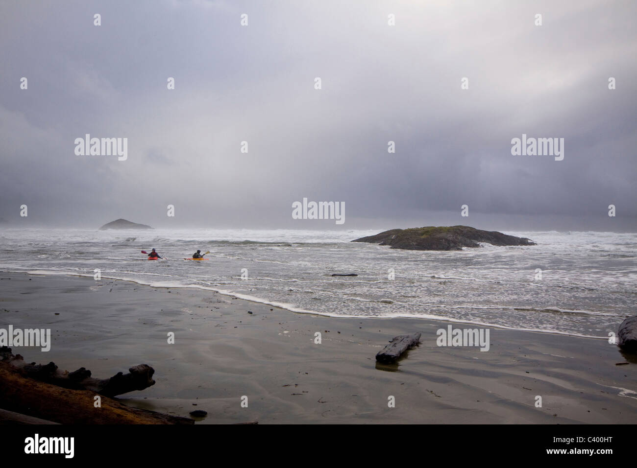 Two kayakers brave the harsh weather and ocean waves, Pacific Rim ...