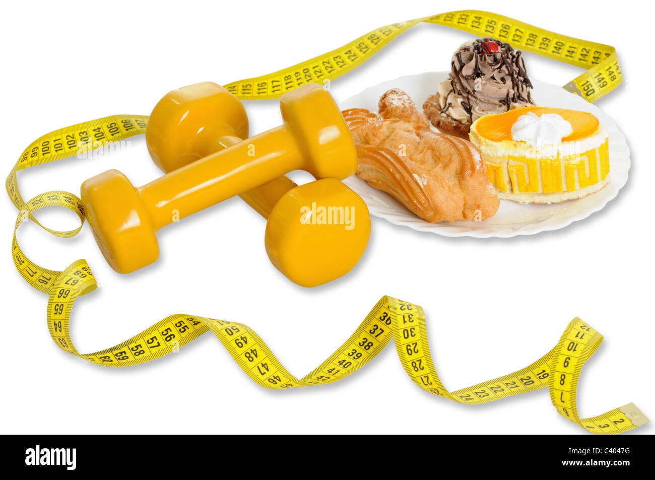 tape measure,cakes and dumbbells isolated on white background Stock ...