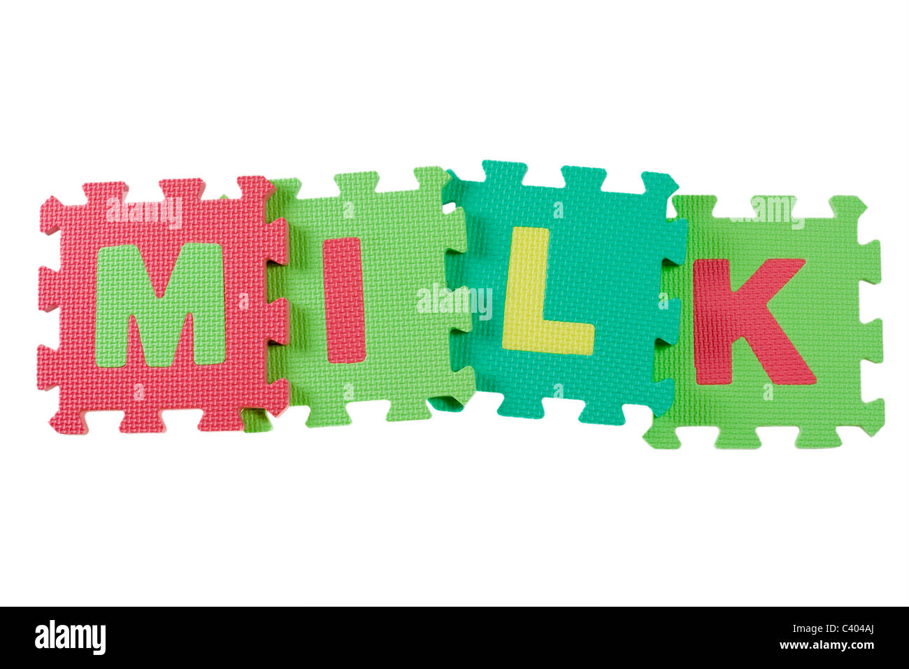 Alphabet blocks forming the word MILK isolated on white background ...