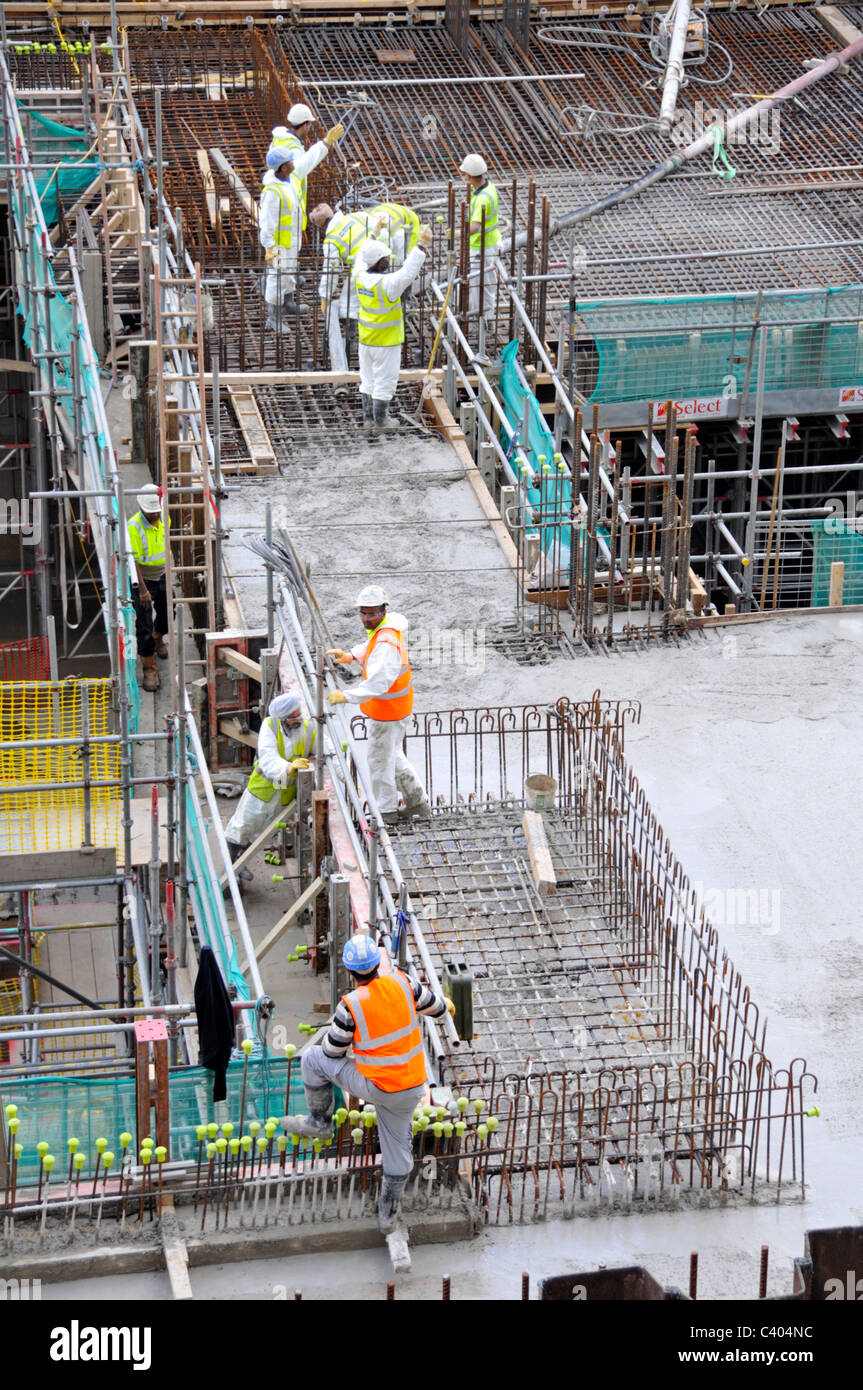 Aerial view construction building site workmen wearing high visibility ...