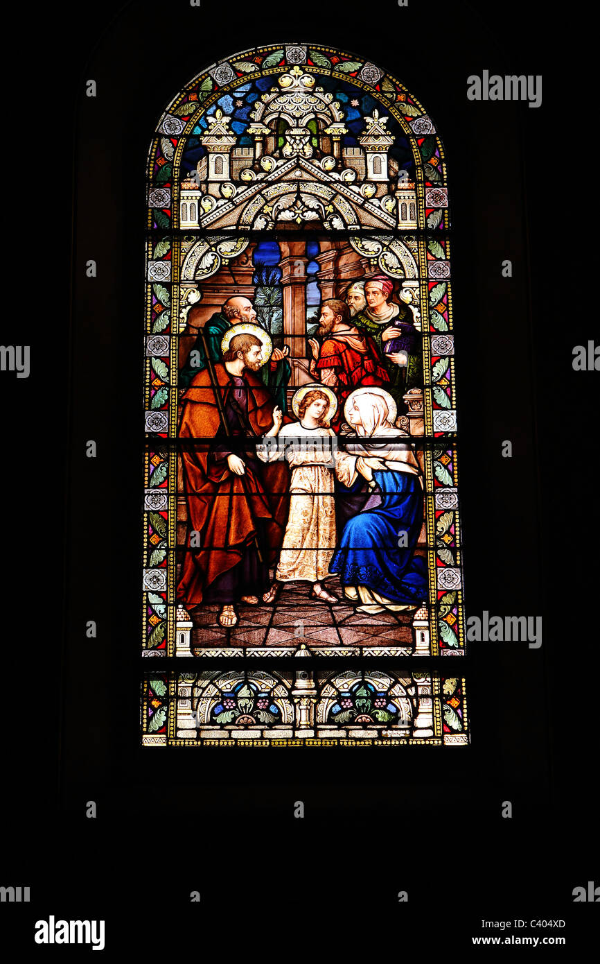 Beautiful painted stained glass window with Christian image Stock Photo ...