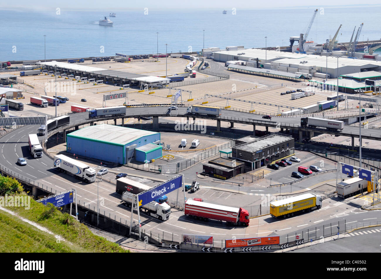 HGV lorry truck & trailer traffic on elevated road leaving Dover Port ...