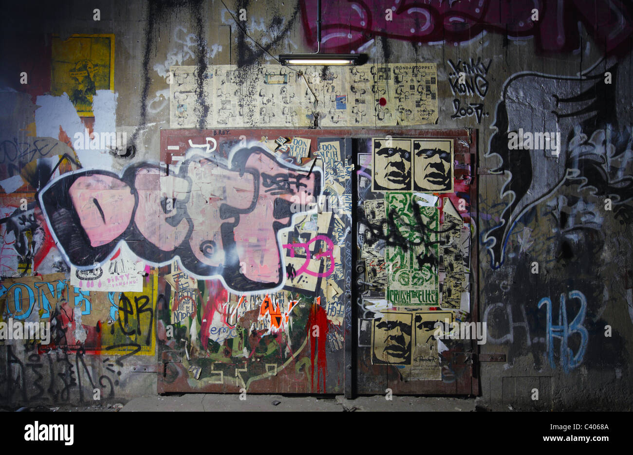 Painted graffiti on a building wall Stock Photo - Alamy