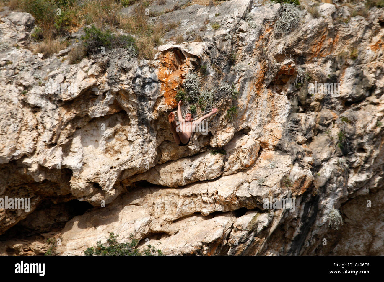 Red Bull Cliff diving at lake Vouliagmeni Athens Greece Stock Photo - Alamy