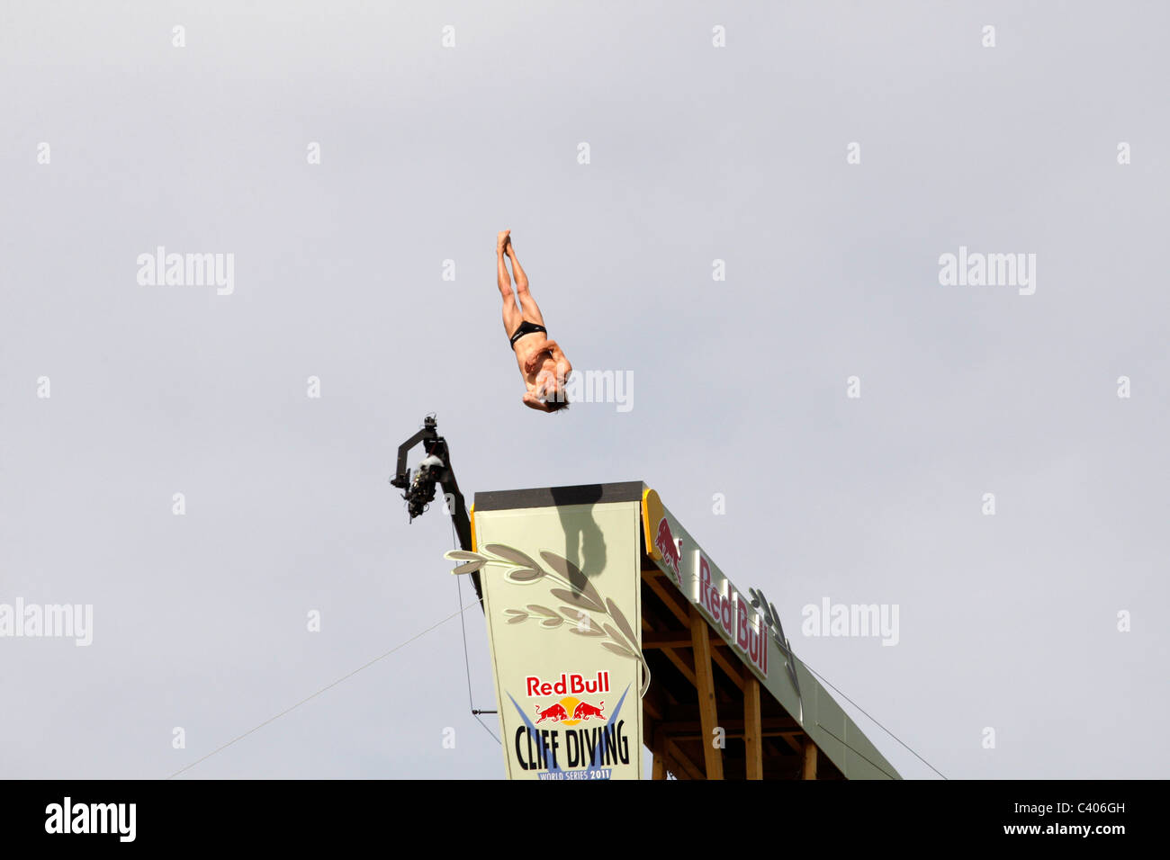 Red Bull Cliff diving at lake Vouliagmeni Athens Greece Stock Photo - Alamy
