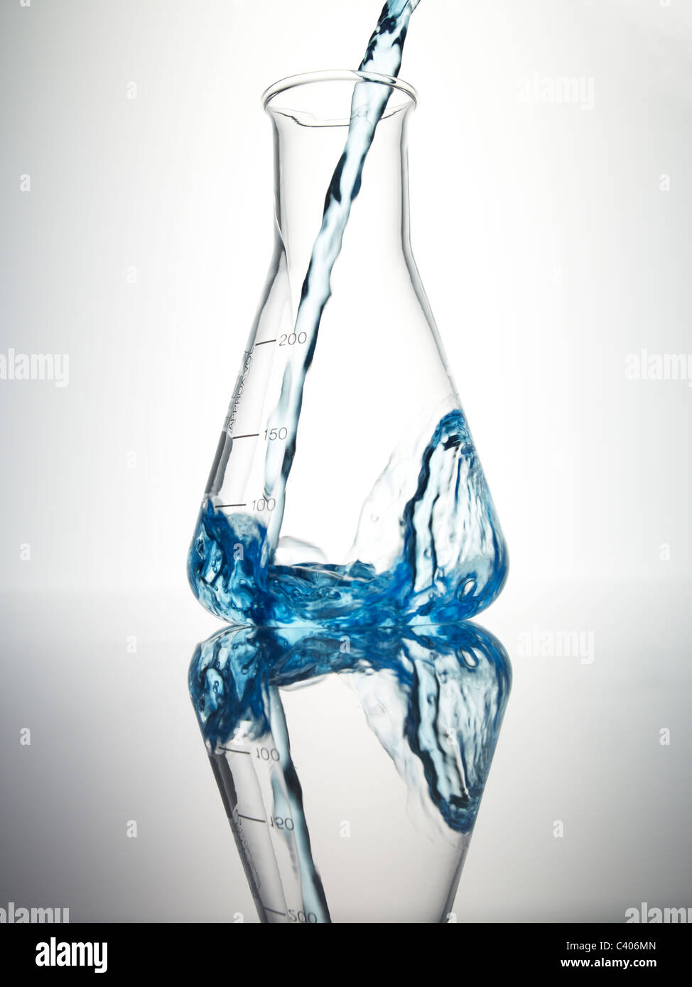 lab flask on a white background Stock Photo - Alamy