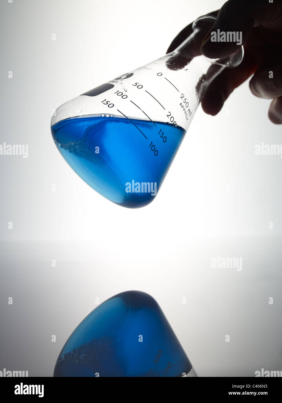 lab flask on a white background Stock Photo - Alamy