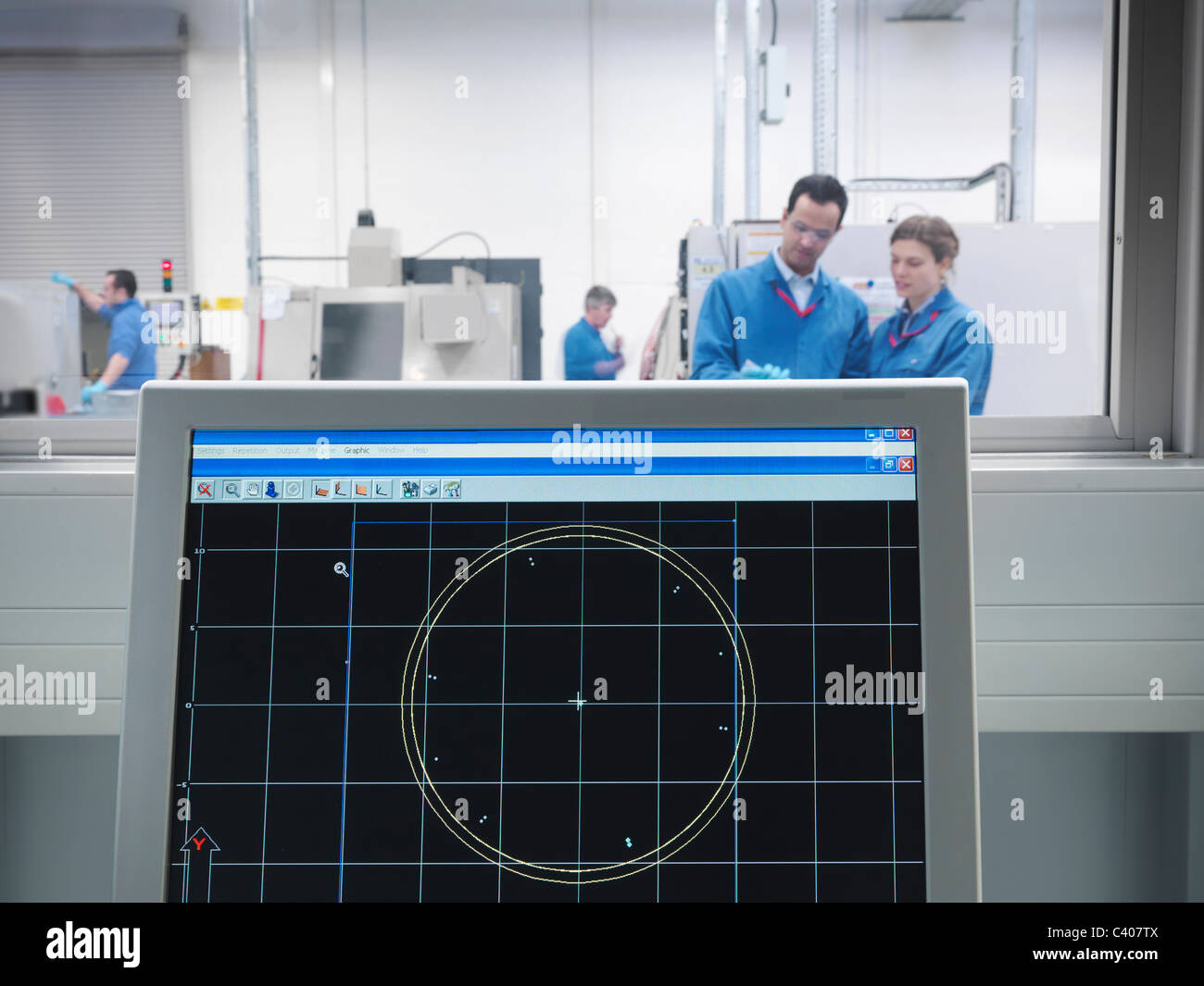 Engineers and CAD drawing on monitor Stock Photo - Alamy