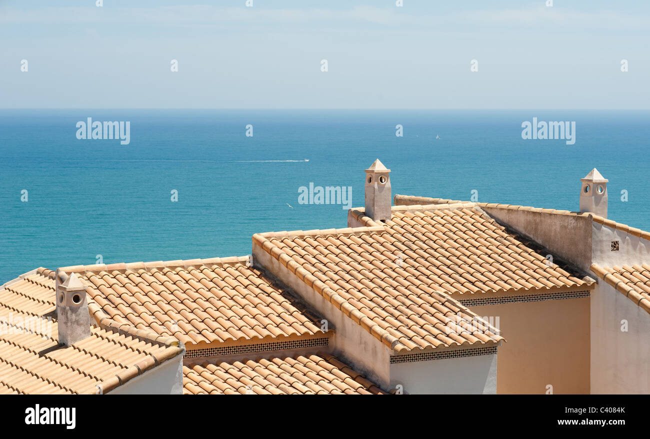Tiled roofs with a spectacular ocean view Stock Photo - Alamy