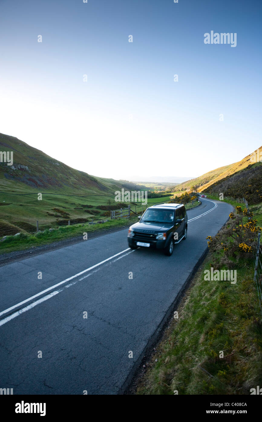 At the roadside of the A823 in the early evening looking towards ...